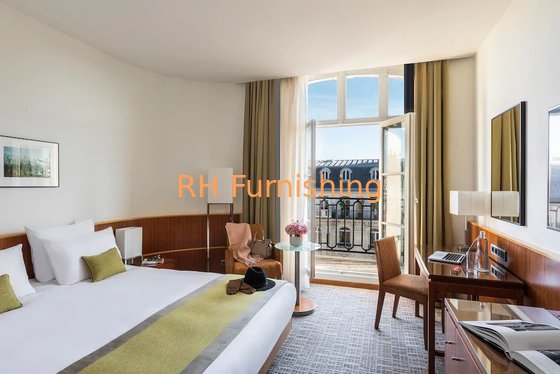 Madagascar hotel bedroom furniture set of wood headboard bed with combine desk table and fabric cushion chairs supplier