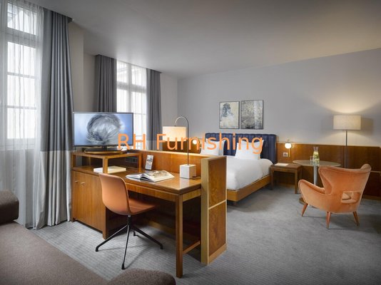 Madagascar hotel bedroom furniture set of wood headboard bed with combine desk table and fabric cushion chairs supplier