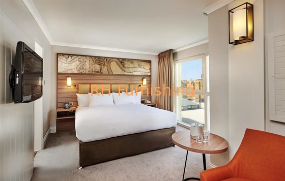 Budget Hotel Bedroom Furniture Leather bed with Leisure chairs and Wood TV Stand Cabinets supplier