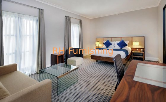 Budget Hotel Bedroom Furniture Leather bed with Leisure chairs and Wood TV Stand Cabinets supplier