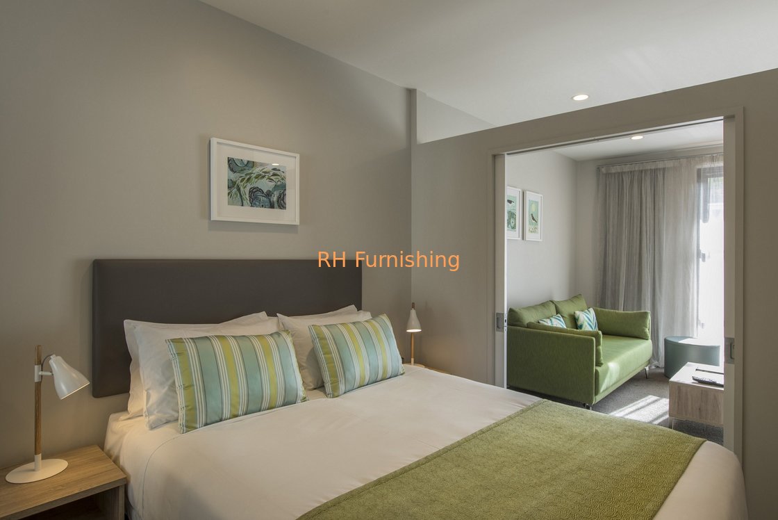 Modern hotel rooms furniture of Apartment style Upholstery headboard bed with Laminate wardrobe and long desk supplier