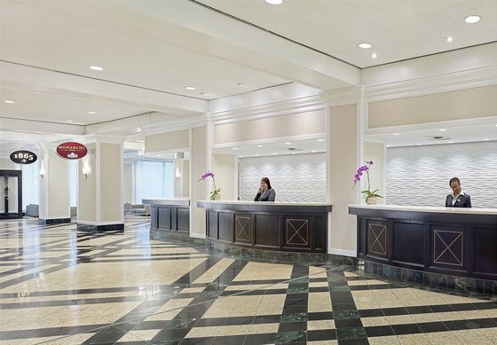 Luxury 5 Star Hotel Lobby Furniture Fabric Sofa Stainless Steel Frame Ebony Reception Table Set supplier