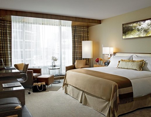 Rubber Wood Bed Hotel Guest Room Furniture With Brown Leather Stainless Steel Ottoman supplier