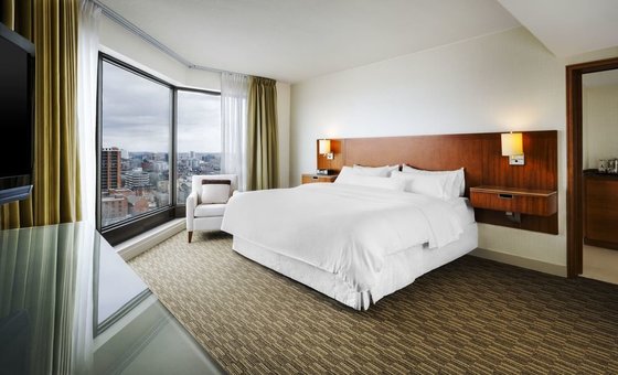 Contemporary Mahogany Panel Full Size Bed Hotel Furniture Set With Leather Chairs supplier