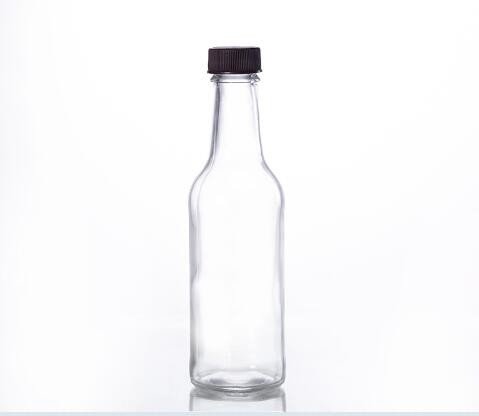 Wholesale 30ml 50ml 100ml 120ml 150ml bamboo stype cosmetic packaging frosted glass bottle with bamboo wooden lotion cap
