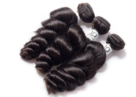 Il tessuto sciolto umano brasiliano dei capelli di 100% Wave per le ragazze 3 impacchetta il grado 9A