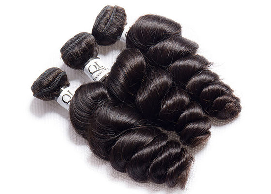 Il tessuto sciolto umano brasiliano dei capelli di 100% Wave per le ragazze 3 impacchetta il grado 9A