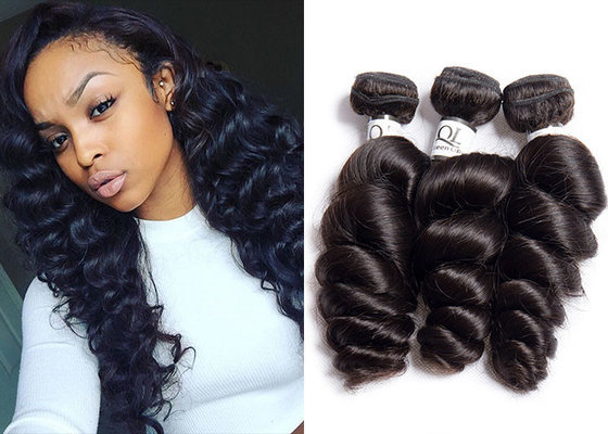 Il tessuto sciolto umano brasiliano dei capelli di 100% Wave per le ragazze 3 impacchetta il grado 9A