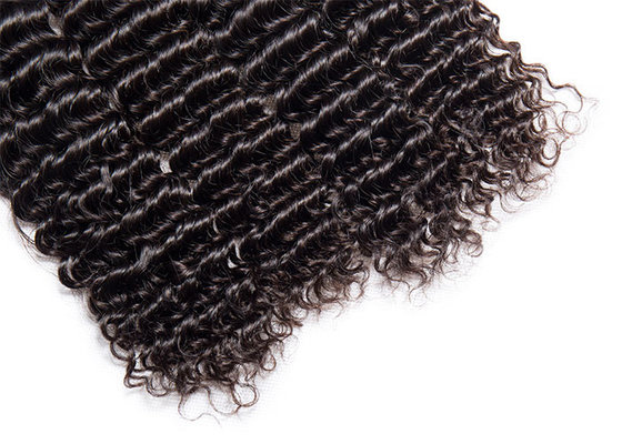 I capelli ricci profondi naturali non trattati impacchettano per la donna di colore a 10-30 pollici