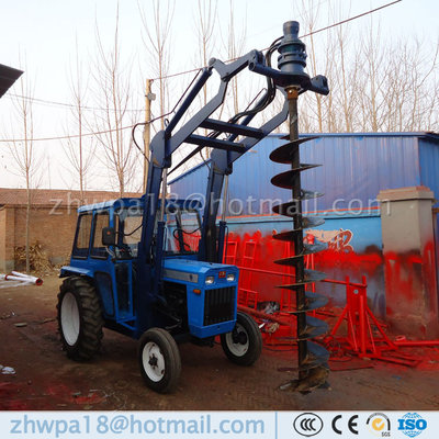 For making tree holes TRACTOR AUGERS BORE THROUGH