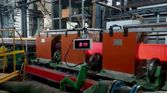 Induction hardening and tempering furnace for steel pipe