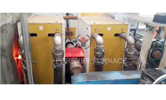 Induction quenching and tempering machine for steel plate