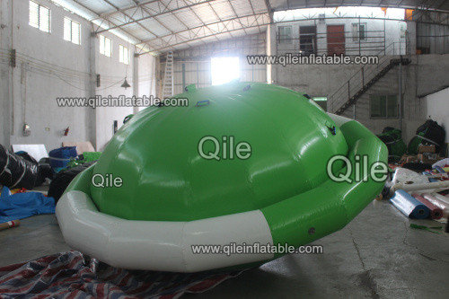 Green Color Commercial Grade PVC Tarpaulin Inflatable Saturn Rocker supplier