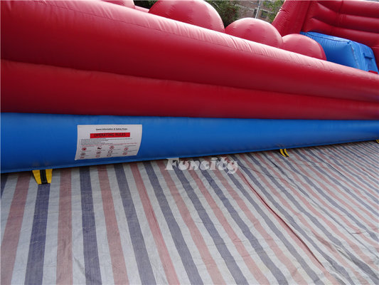 Red Tarpaulin Inflatable Jumping Castle / Wipeout Obstacle Course 10x4m