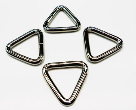 Heavy Welded Triangle TrNicklei-Rings