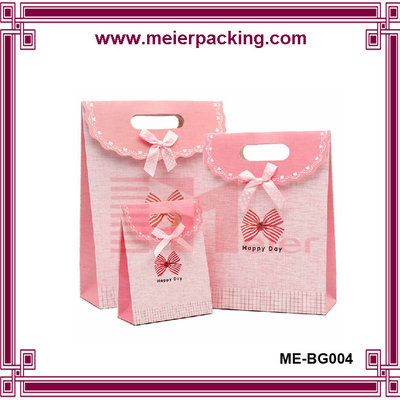 China Modern Funny Craft paper matte pink gift bags with die-cut handle and ribbon bow supplier