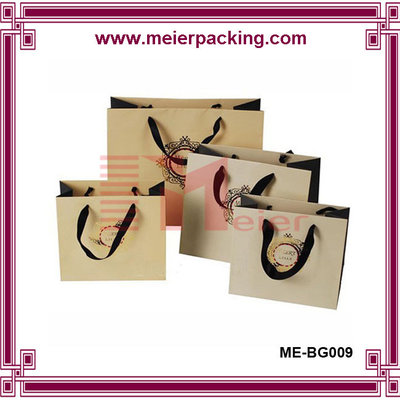 China Customized Craft paper bag with your logo printed with cloth handle in packaging supplier