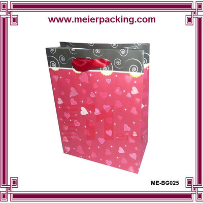 China Top grade glossy lamination CMYK printing useful beautiful wedding candy gift paper bag with red ribbon supplier