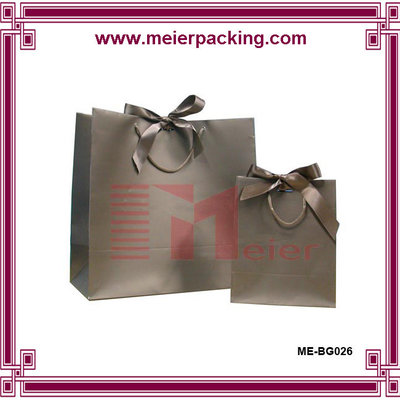 China promotional new luxury shopping paper bag with ribbon closure for men cloth supplier