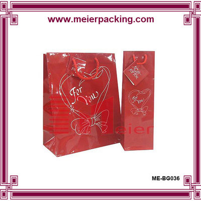 China Custom logo wedding gift paper bag with rope handles from direct factory supplier