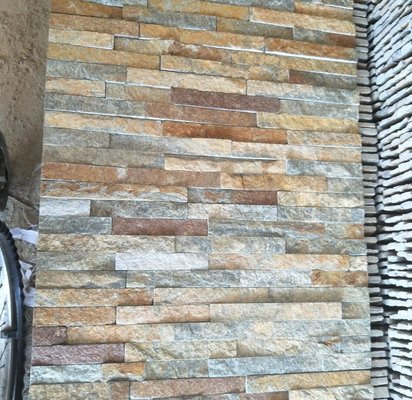 Rusty yellow beige grey slate cultured stone wall panels veneer cladding tiles stacked sotne ledge stone glued