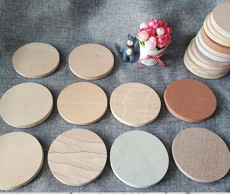 yellow wooden grain sandstone round coaster with cork backing 10mm diameter