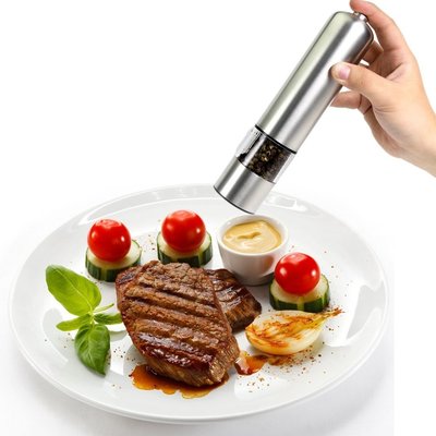 Electrical salt and pepper mill with lid