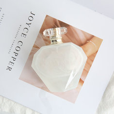 China Customized Luxury Fashion Milky White Perfume Bottle Cap Logo Customization supplier