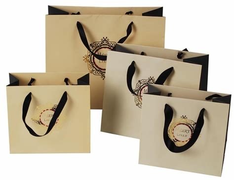wholesale paper gift shopping bags with rope handles,luxury lamination customized paper gift shopping bag with handles