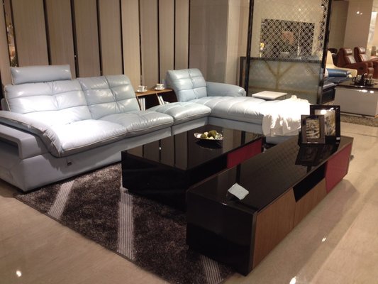 China modern living room genuine leather sectional sofa furniture supplier