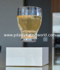 wireelss base rechargeable magnetic levitation cup glass X  Zero Gravity Drinkware display racks