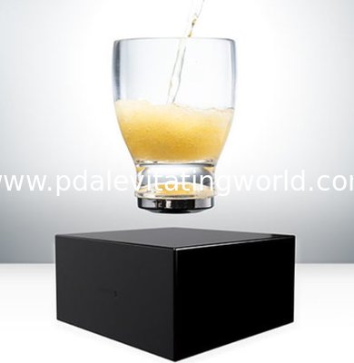 wireelss base rechargeable magnetic levitation cup glass X  Zero Gravity Drinkware display racks