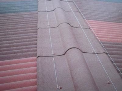 Corrugated cladding, roofing tile, roofing sheet