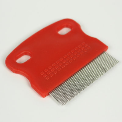 Stainless steel and plastic Flea comb in dogs and cats Short type red color