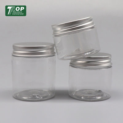 小さく明確なクリーム色の容器化粧品50mlはアルミニウムふたが付いているプラスチック瓶をかわいがる