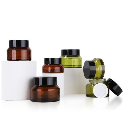 黒いふたが付いているオリーブ色のFDA 15gの化粧品のクリームの瓶