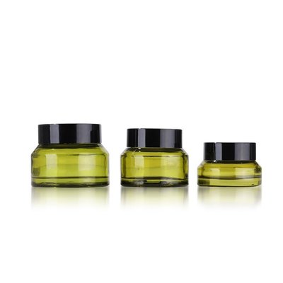 黒いふたが付いているオリーブ色のFDA 15gの化粧品のクリームの瓶
