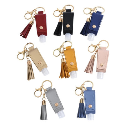 携帯用ピンクの黒い革Keychianの空のプラスチック旅行手のSanitizarのゲルのびん