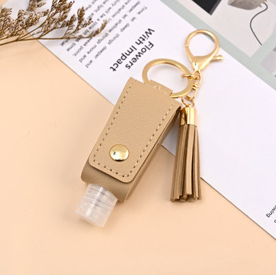 携帯用ピンクの黒い革Keychianの空のプラスチック旅行手のSanitizarのゲルのびん