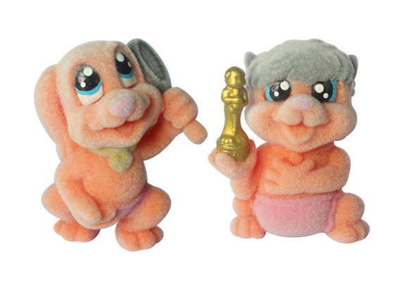 Divertente delle figurine di plastica rosa arancio del cane di modo piccolo con l'affollamento del tocco