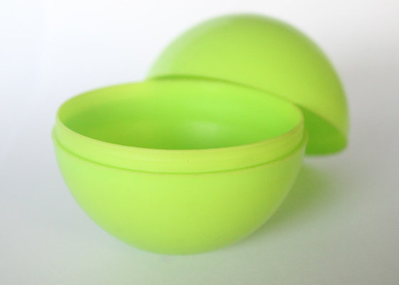 Capsule di plastica verdi solide del giocattolo, capsule di plastica rotonde del giocattolo dell'uovo di 7cm per i distributori automatici