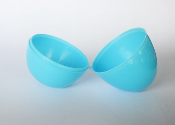 Il distributore automatico vuoto di plastica collettivo incapsula l'uovo ovale blu per la decorazione di festa