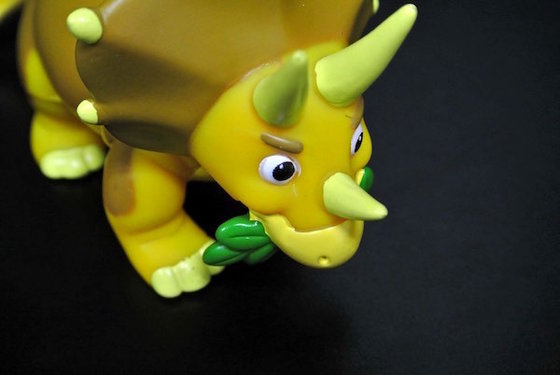 6 Inch Yellow Dinosaur Collectible Vinyl Toys 80 - 90 Degree For Kids Play supplier