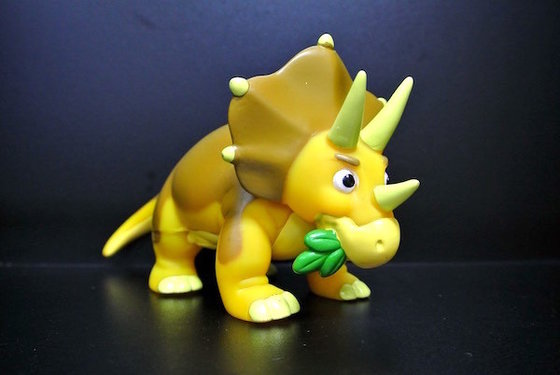 6 Inch Yellow Dinosaur Collectible Vinyl Toys 80 - 90 Degree For Kids Play supplier