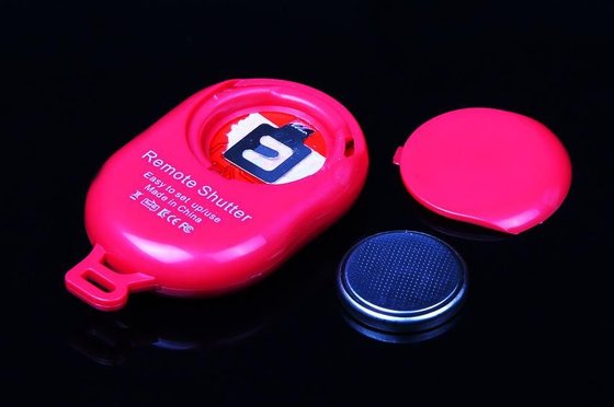mini waterproof wireless remote shutter For make photos , red / pink / blue
