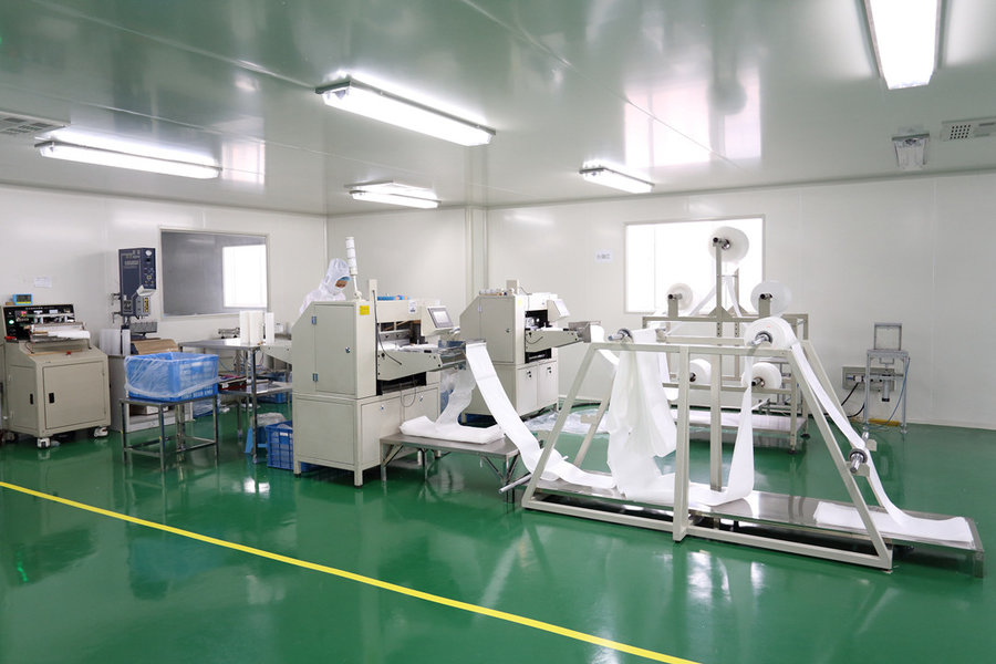 Hangzhou Tianshan Precision Filter Material Co., Ltd línea de producción del fabricante