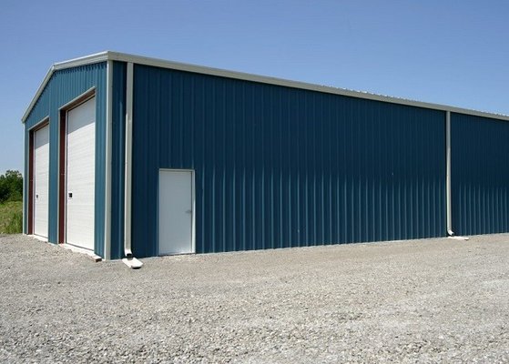 Prefab Steel Building Homes / Steel Frame Residential Homes With Roller Shutter Door