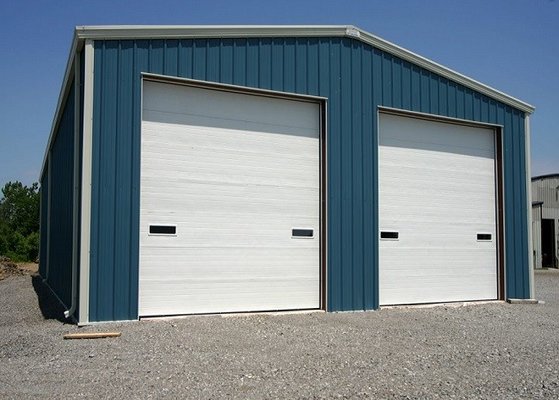 Prefab Steel Building Homes / Steel Frame Residential Homes With Roller Shutter Door