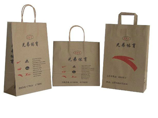 sacos de papel marrons com punhos