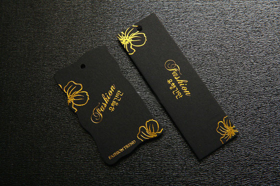 O cair de papel dourado de carimbo quente etiqueta o papel do cartão do preto de Picese de dois papéis